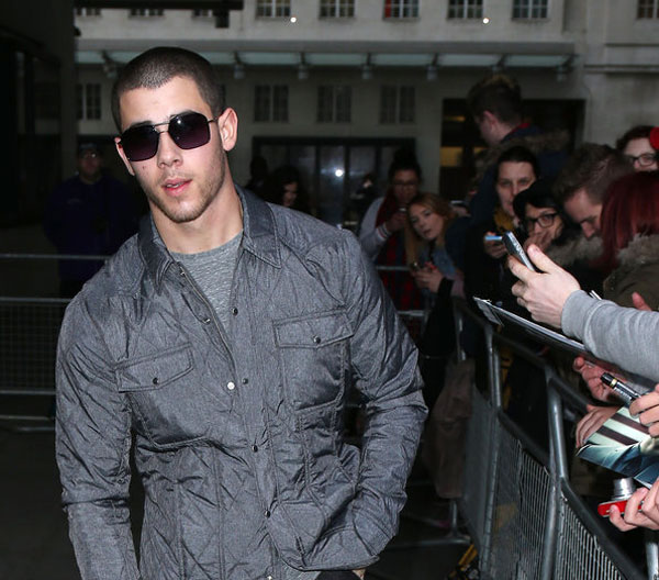 Nick Jonas Takes A Stroll In London In Sama's Loree Rodkin Sunglasses ...